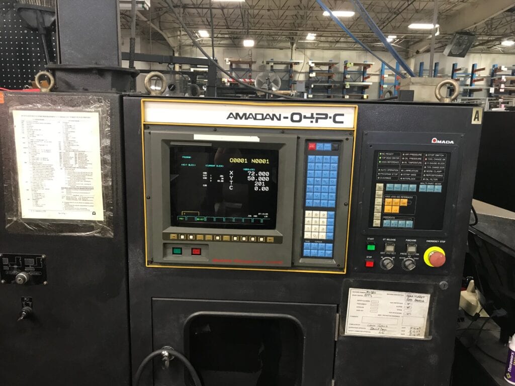 55 Ton Amada Coma-557 CNC Turret Punch, 1994 - Revelation Machinery