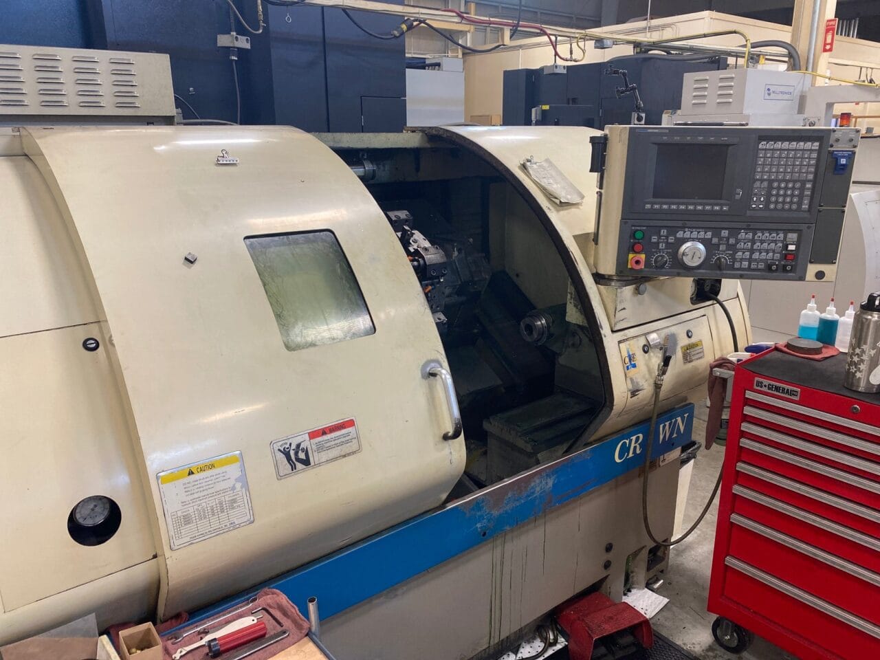 Okuma Crown 762E CNC Lathe, 1997 - w/OSP700L Control, 8" Chuck, Tool ...