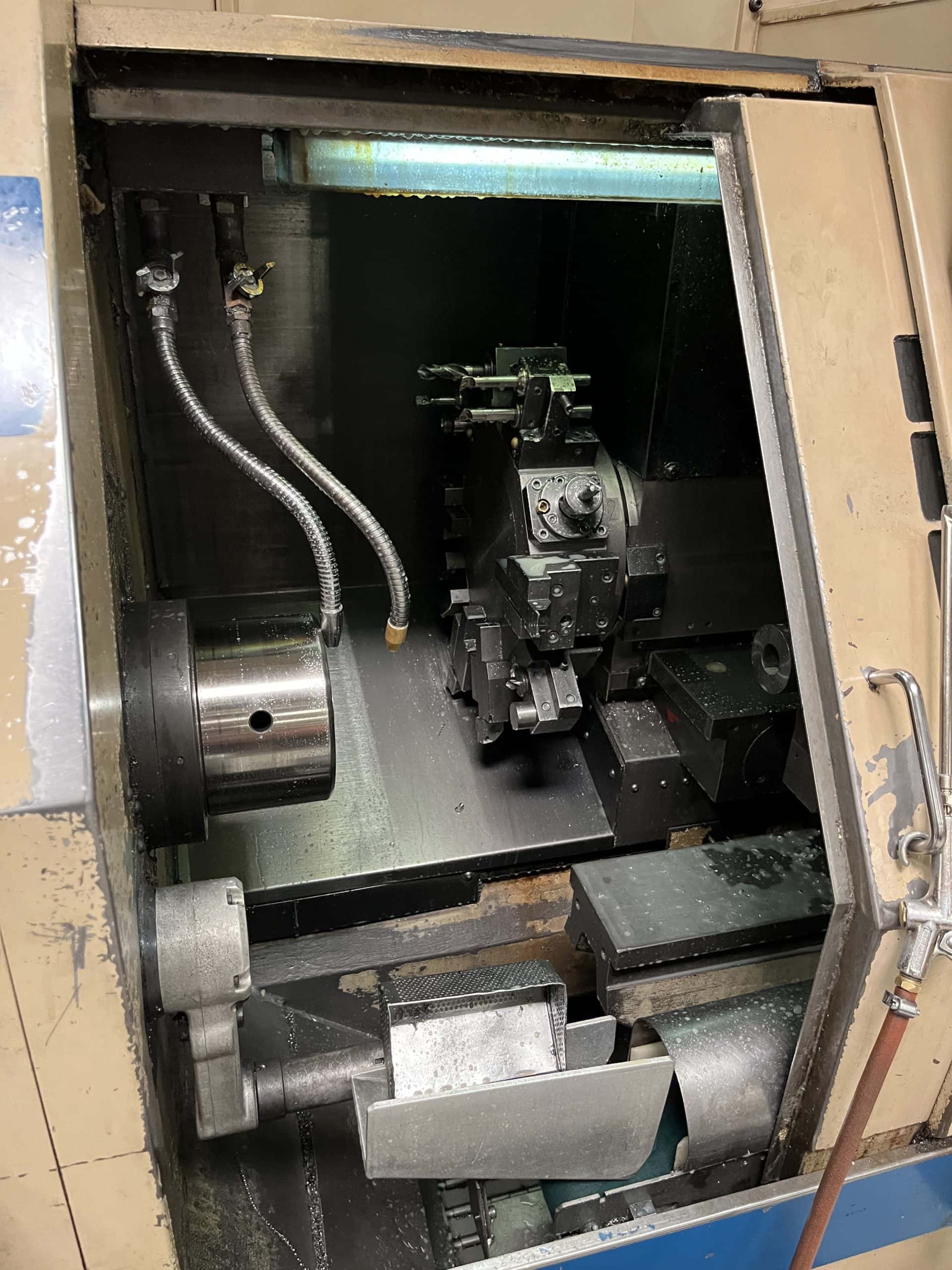 Miyano LE22 CNC Lathe, 1988- Bar Feeder, Chip Conveyor, Fanuc Control ...