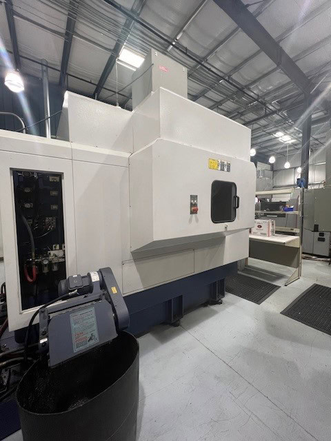 YCM TCV51A Twin Pallet VMC, 2005 - 32 ATC, Fanuc - Revelation Machinery