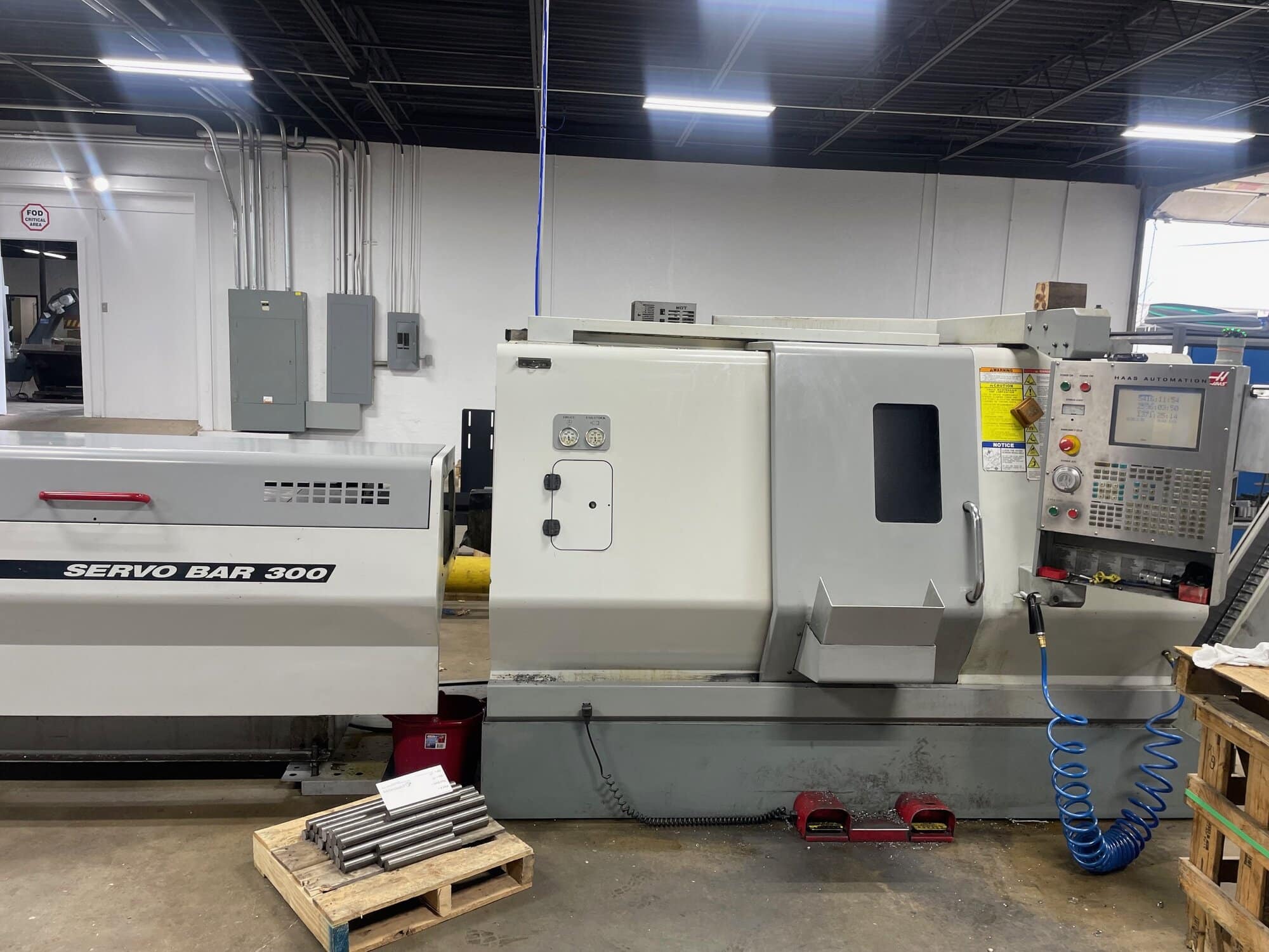 Haas SL-20T CNC Lathe, 2006 - Barfeed, Chip Conveyor, - Revelation ...
