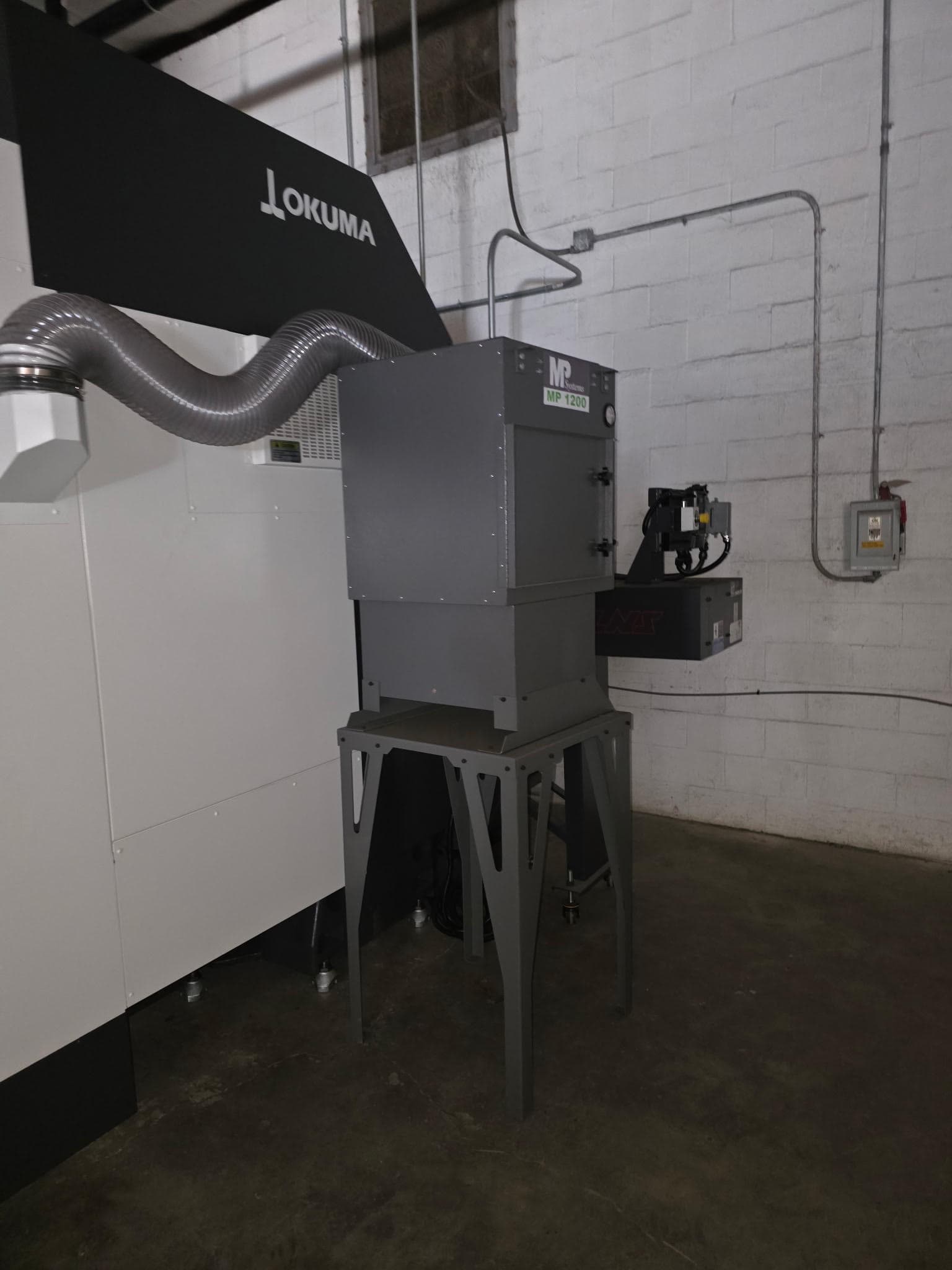 Okuma Genos M560‑V Vertical Machining Center, 2023 - with Tsudakoma ...